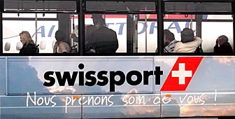 Swissair restructure sa filiale Swissport - SWI swissinfo.ch