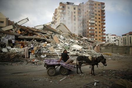 Netanyahu warns Gaza civilians after Israel destroys apartment block ...