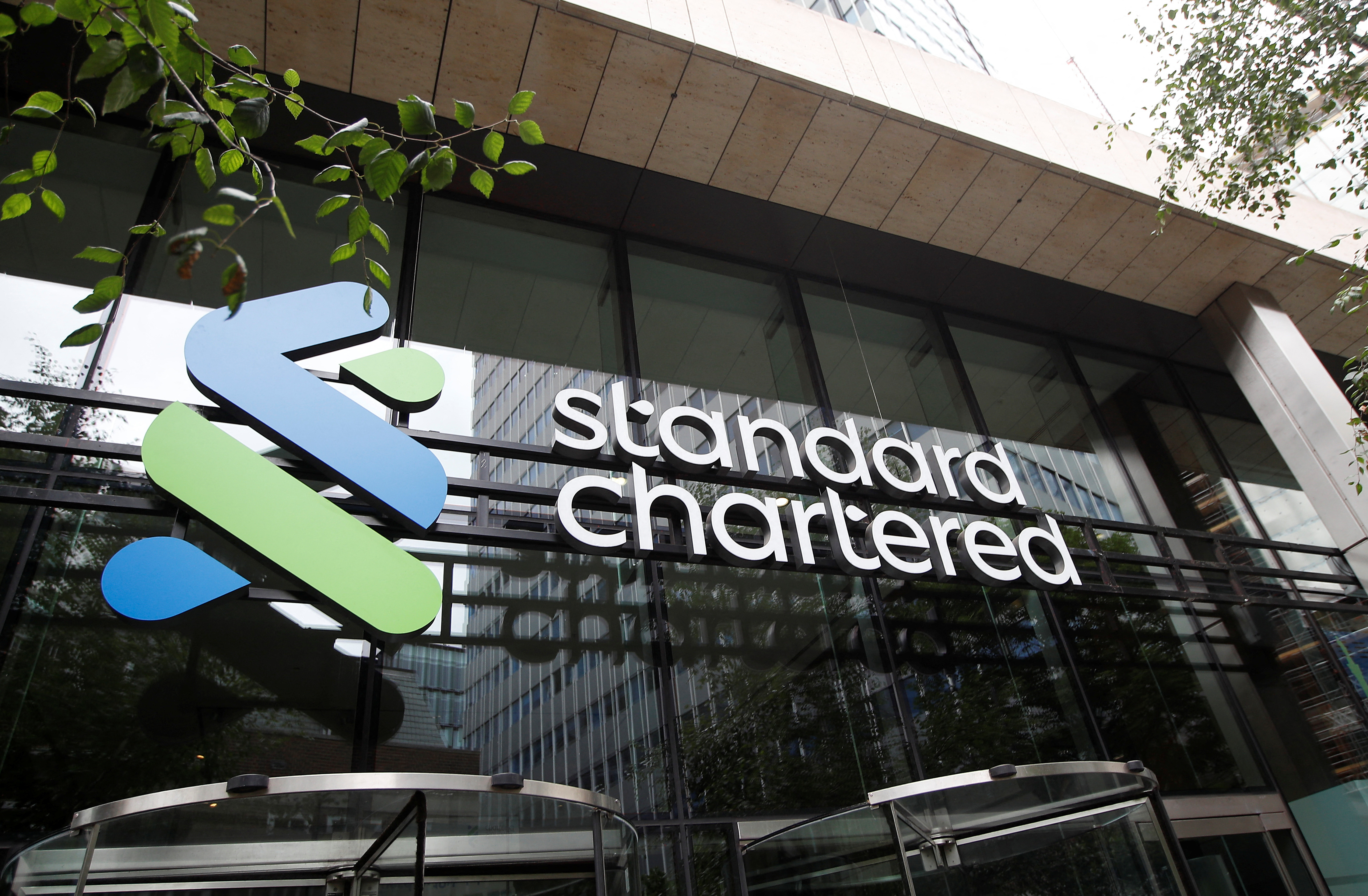 StanChart unveils big buyback, shares jump as CEO bemoans 'crap' share ...