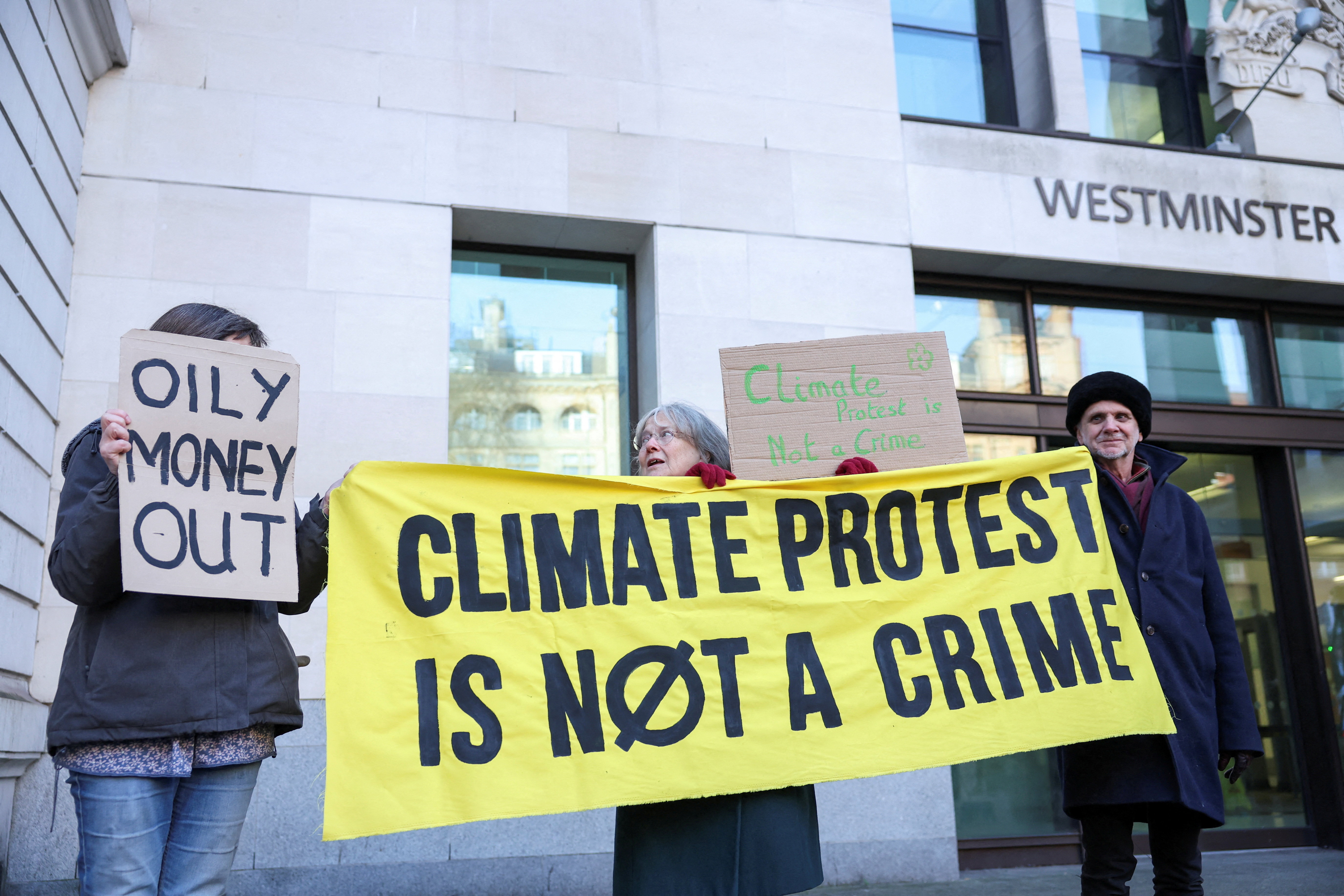 UK judge dismisses case against climate activist who held up sign ...