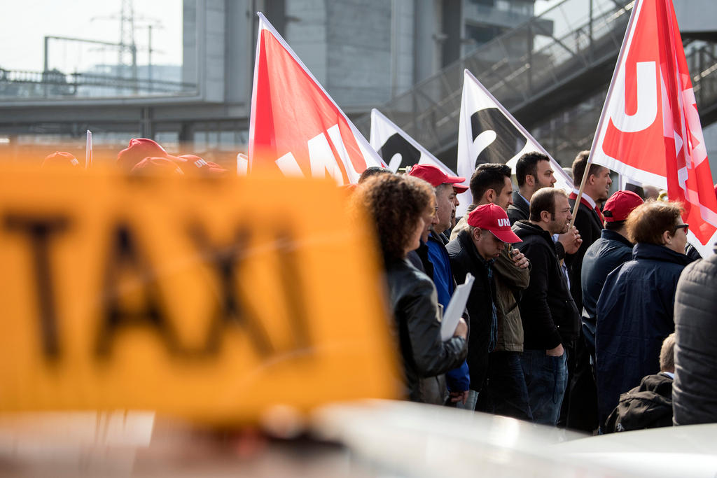 Swiss unions slam public service alliance with Uber - SWI swissinfo.ch