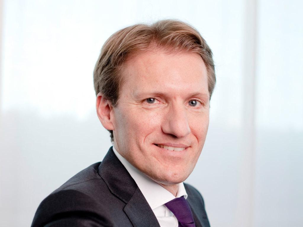 Swiss Re-Manager wird Chef von Hannover Rück - SWI swissinfo.ch