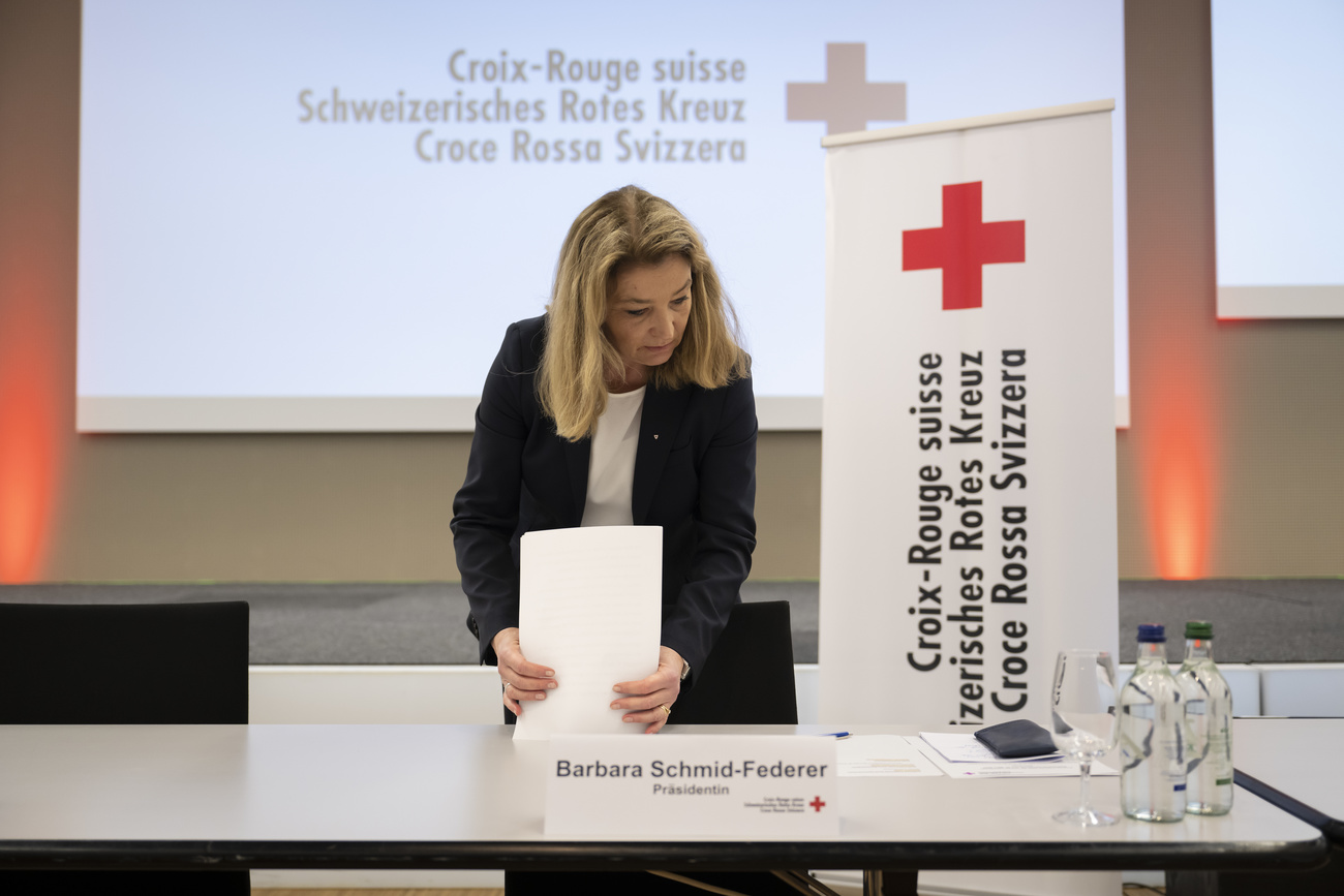 Swiss Red Cross president steps down after damning report - SWI ...
